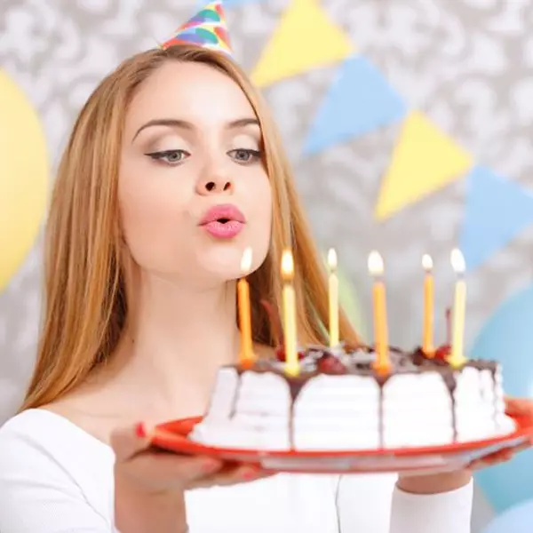 Girl with a festive cake