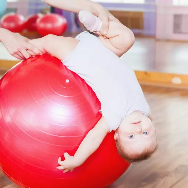 Child on a gymnastic ball